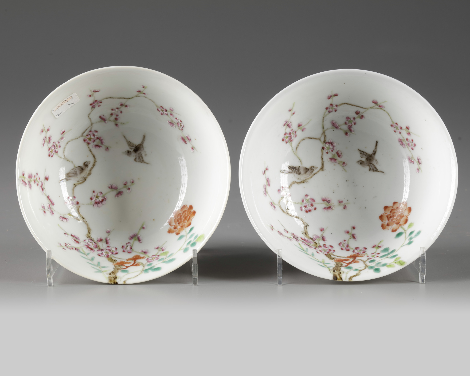 A pair of Chinese famille rose 'magpie and prunus' bowls