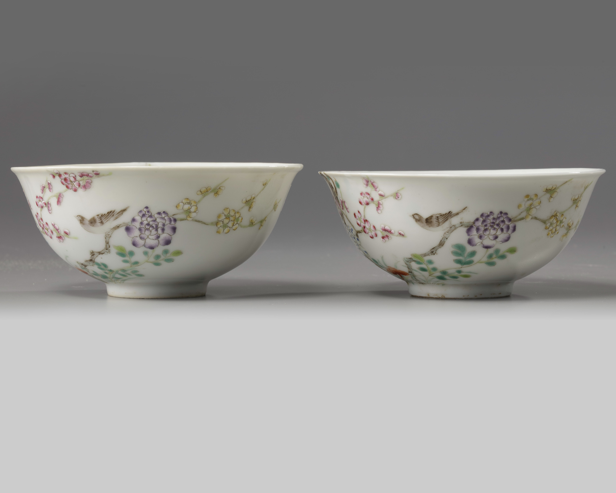 A pair of Chinese famille rose 'magpie and prunus' bowls