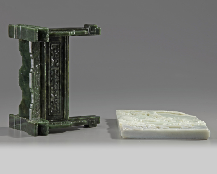 A CHINESE PALE CELADON JADE TABLE SCREEN ON A SPINACH JADE STAND