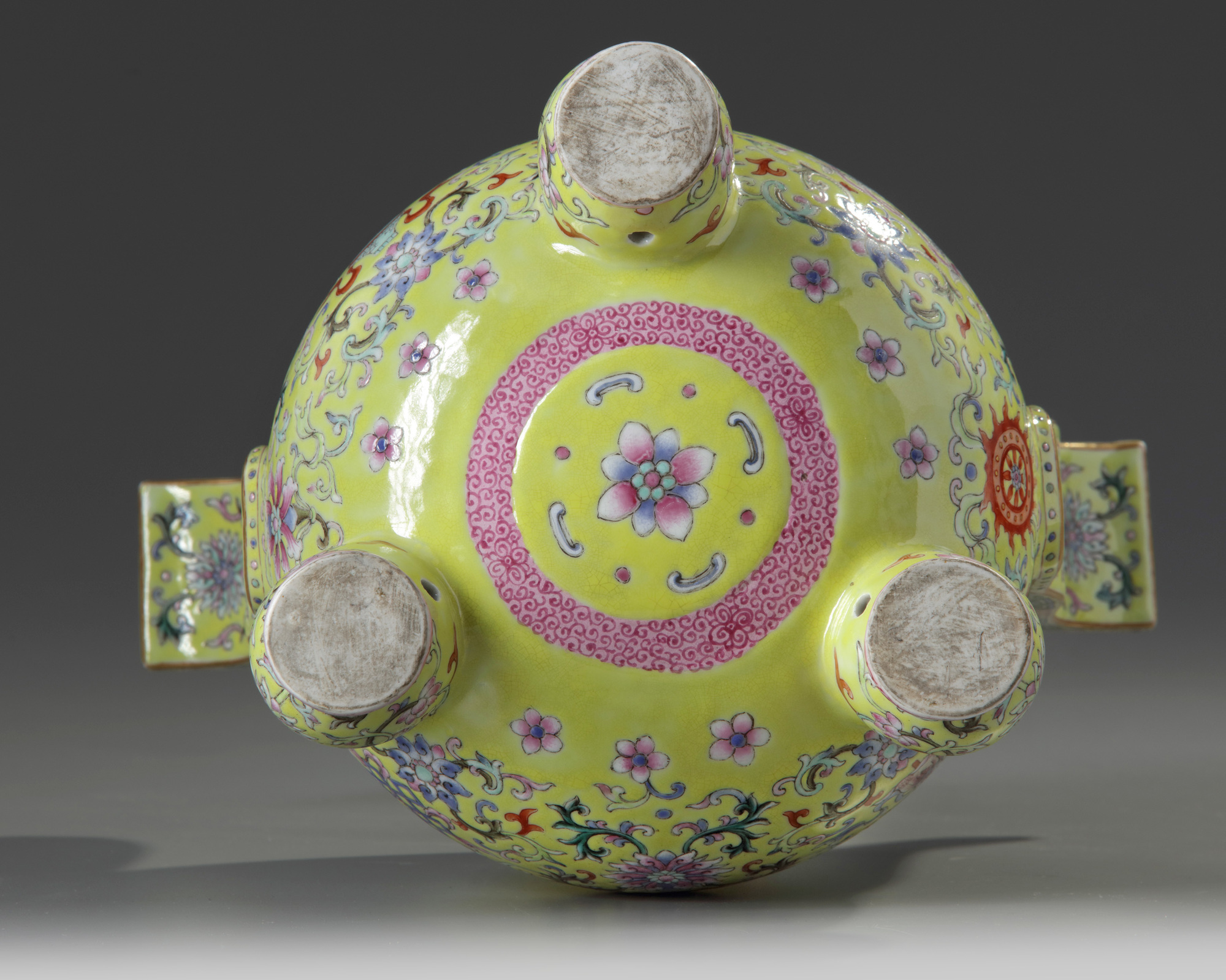 A Chinese yellow-ground famille rose tripod censer