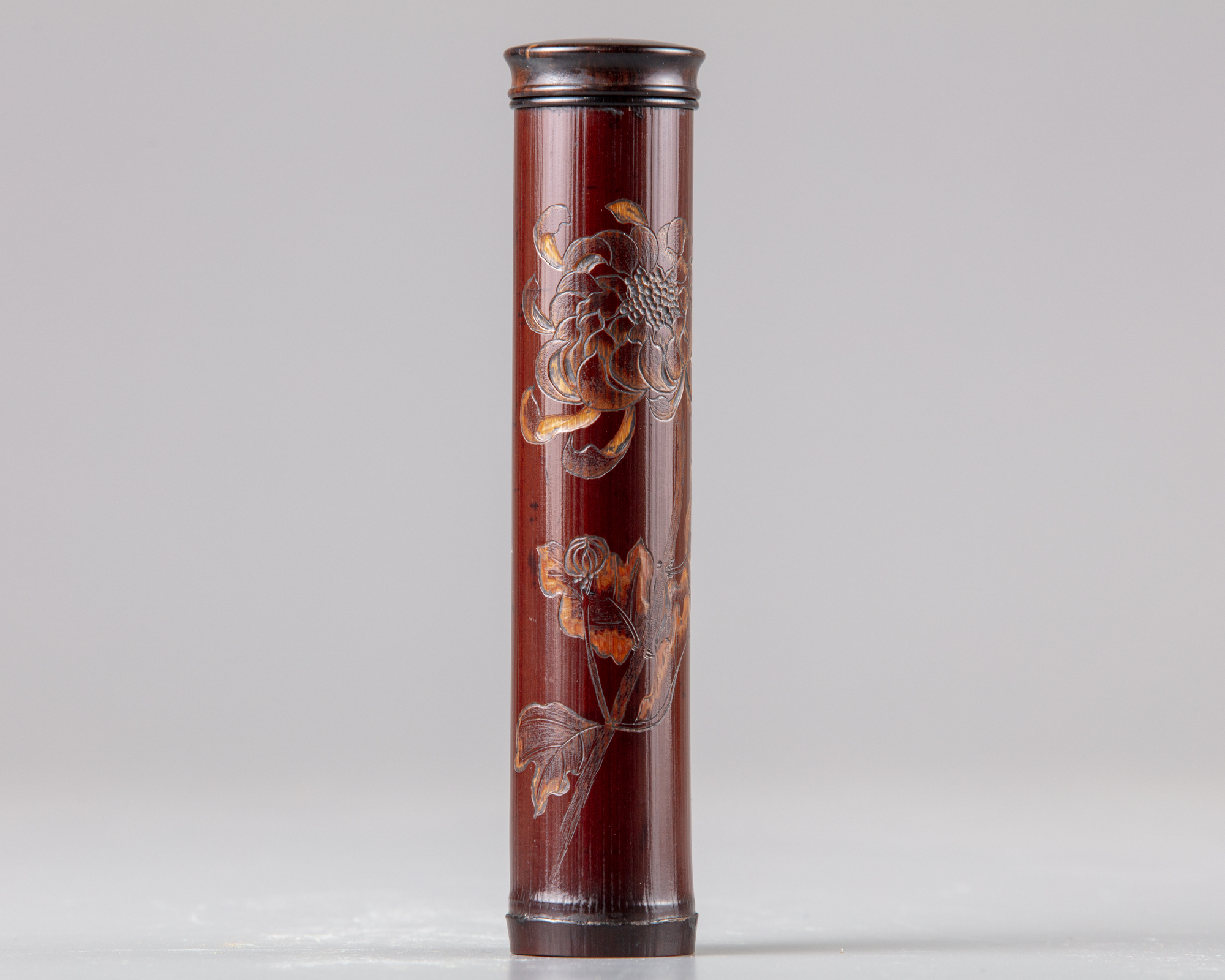 A cylindrical bamboo joss-stick holder