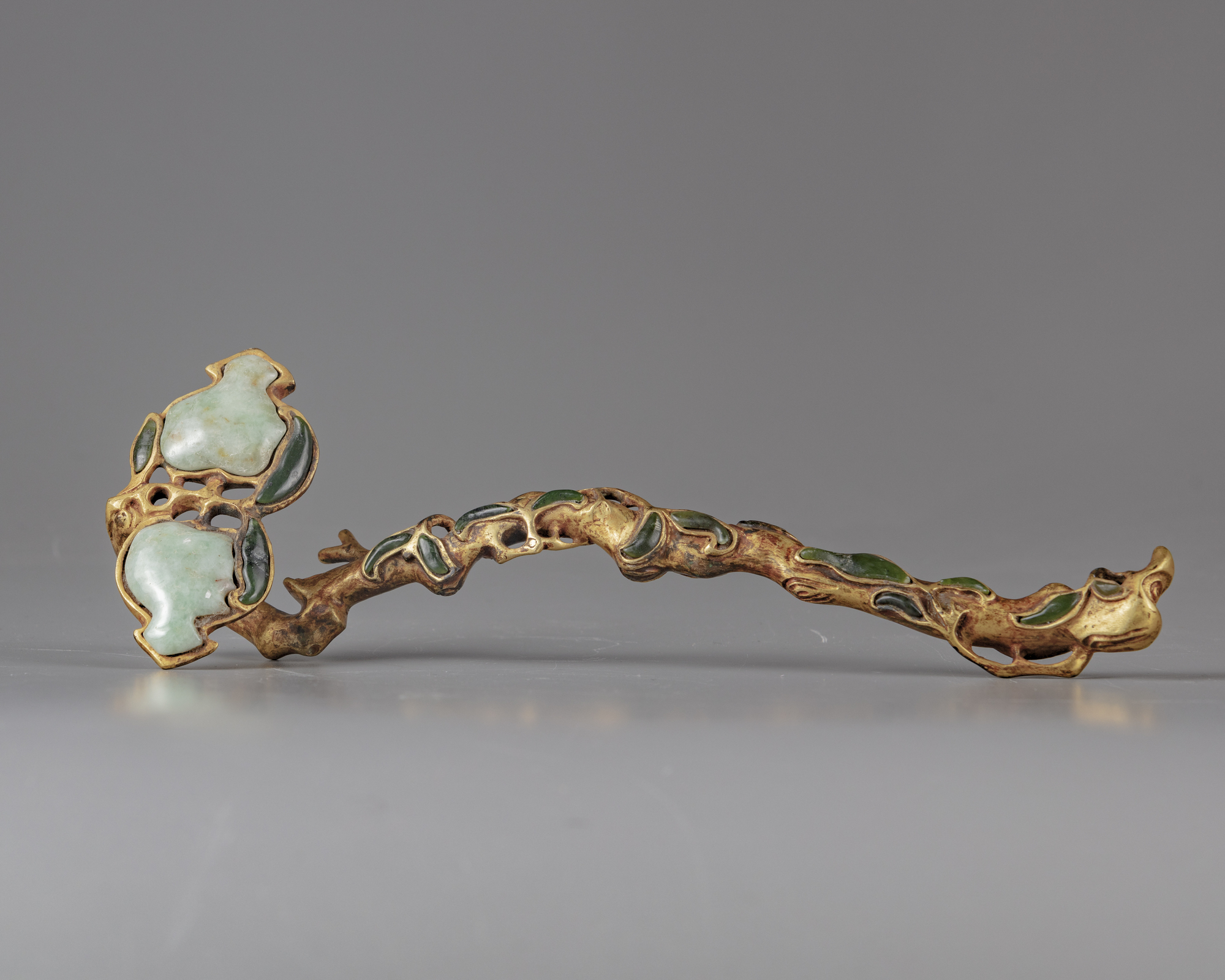 A CHINESE GILT BRONZE SCEPTRE WITH JADE INLAY