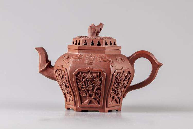 A Chinese hexagonal Yixing teapot