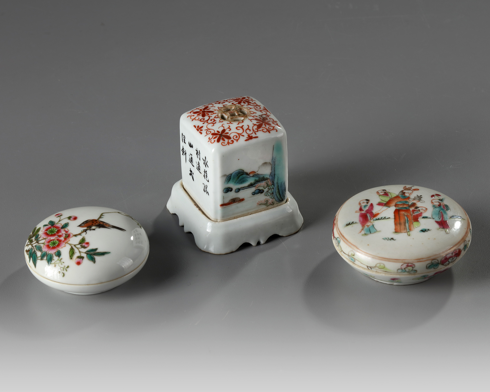 A Chinese porcelain seal box and two seal paste boxes