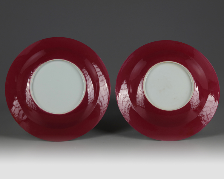 A PAIR OF CHINESE RUBY-BLACK 'LADY AND BOYS' DISHES, 20TH CENTURY