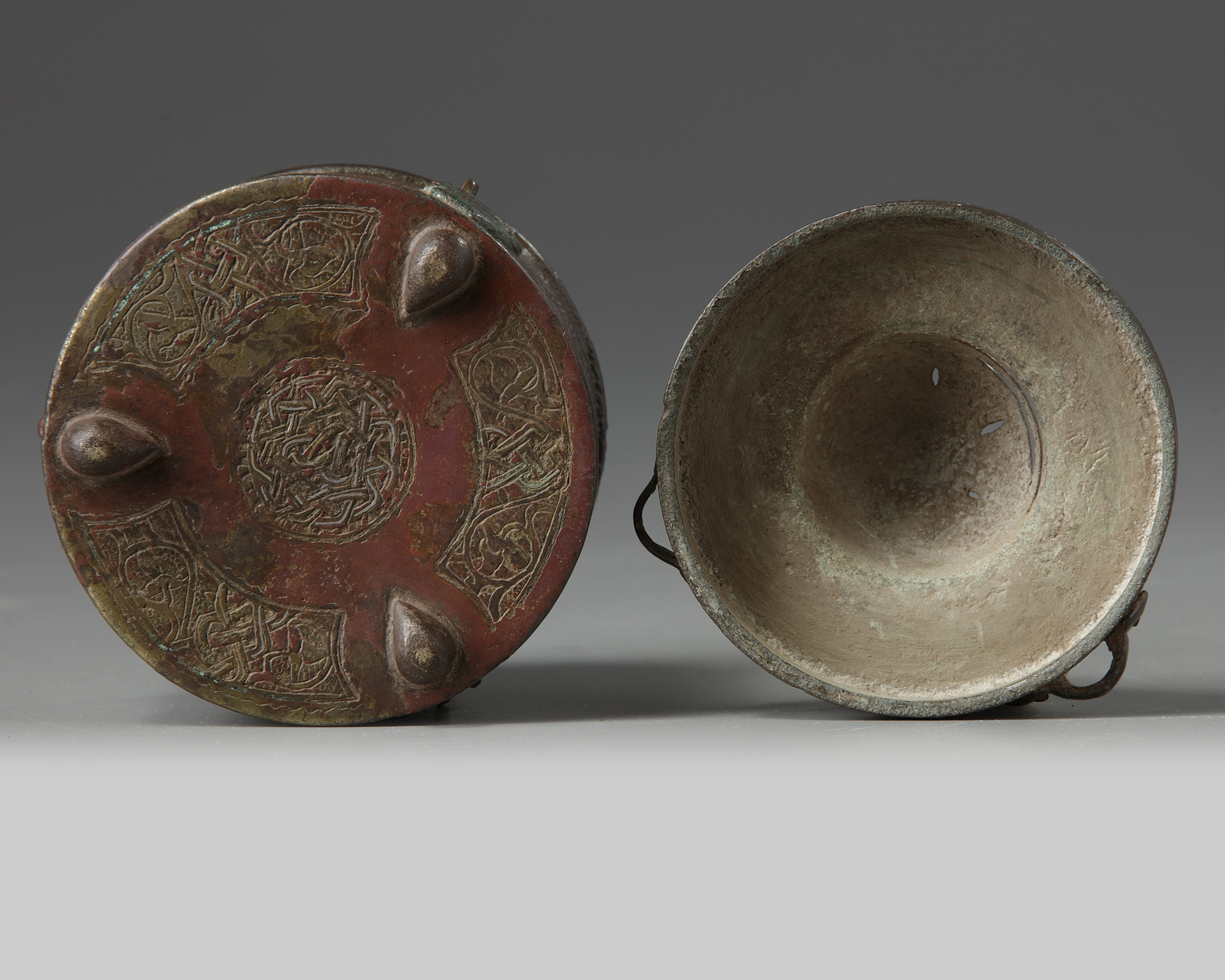 A BRONZE PERSIAN SILVER INLAID INKWELL