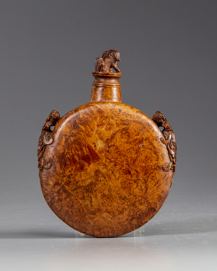A Chinese wooden moon flask