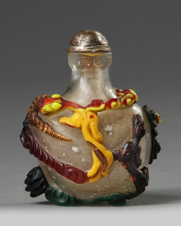 A Chinese multi-color carved overlay glass snuff bottle