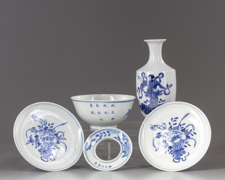 A group of four blue and white items