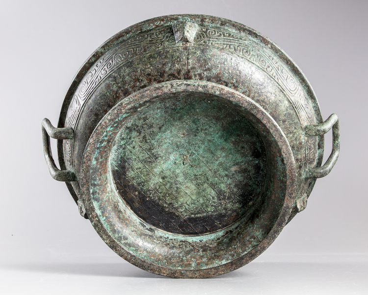 A CHINESE BRONZE RITUAL WATER VESSEL, PAN, ZHOU STYLE