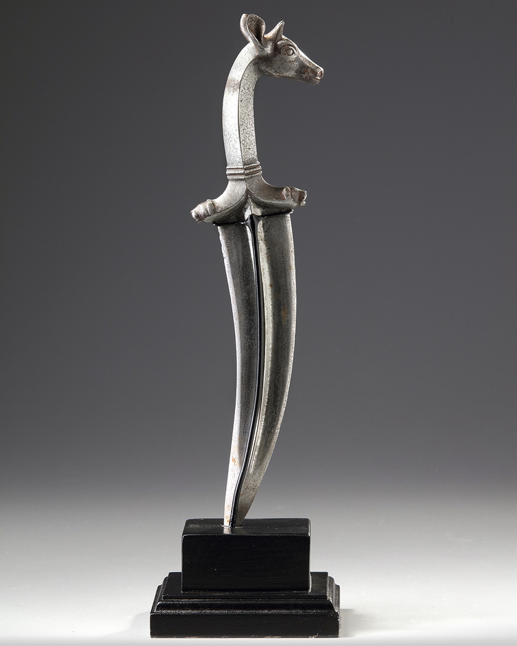 A MUGHAL METAL DEER HILTED DAGGER