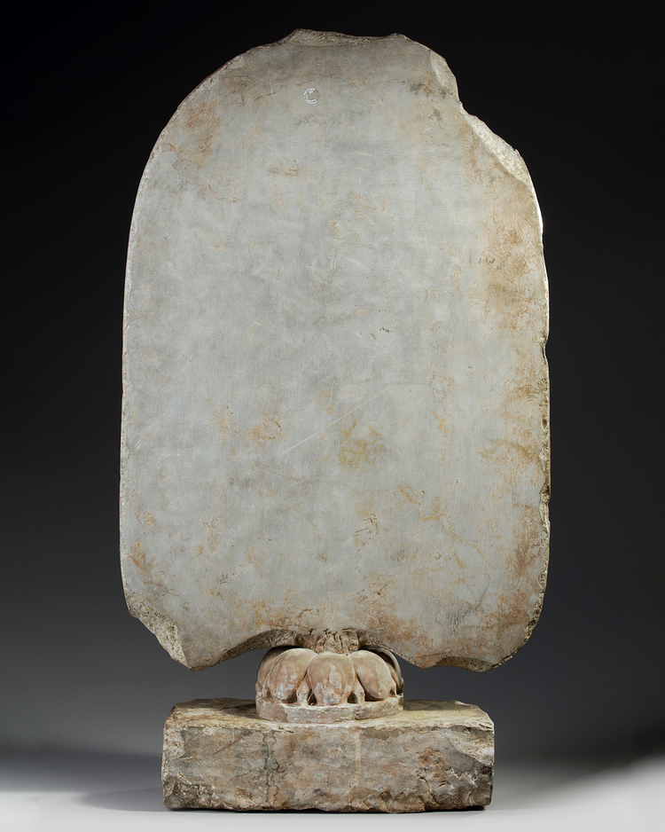 A large Chinese stone stele Buddhist triad