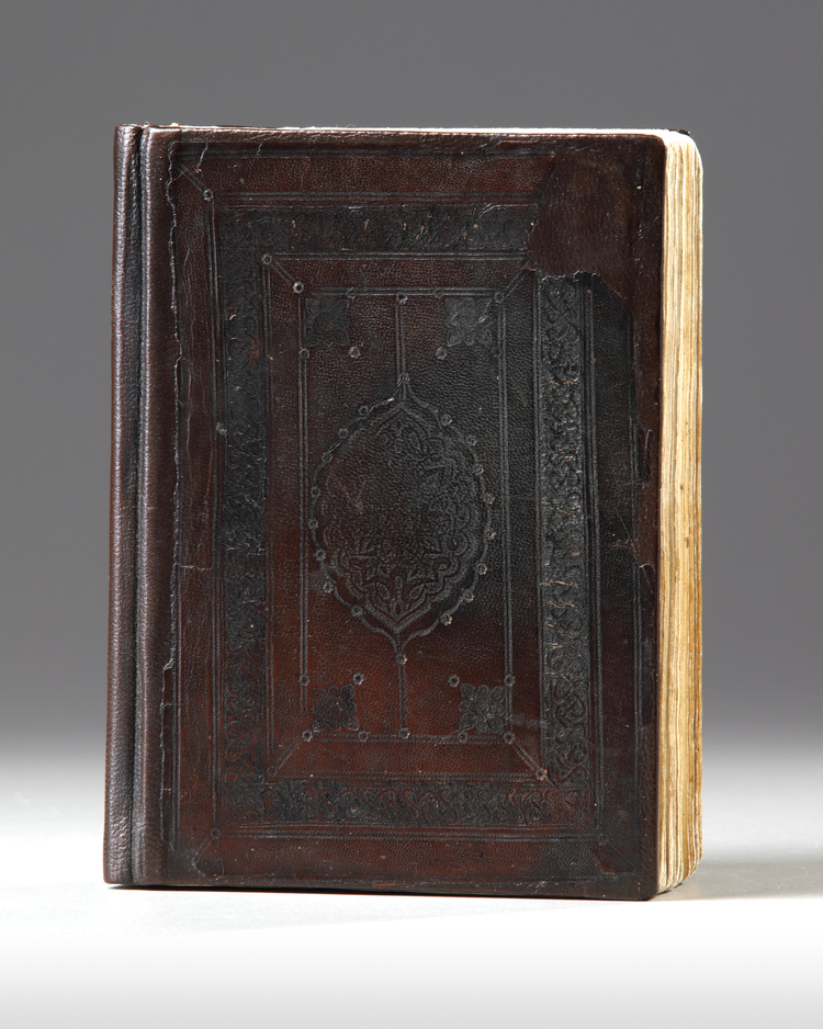 A MORROCAN LEATHER-BOUND QURAN