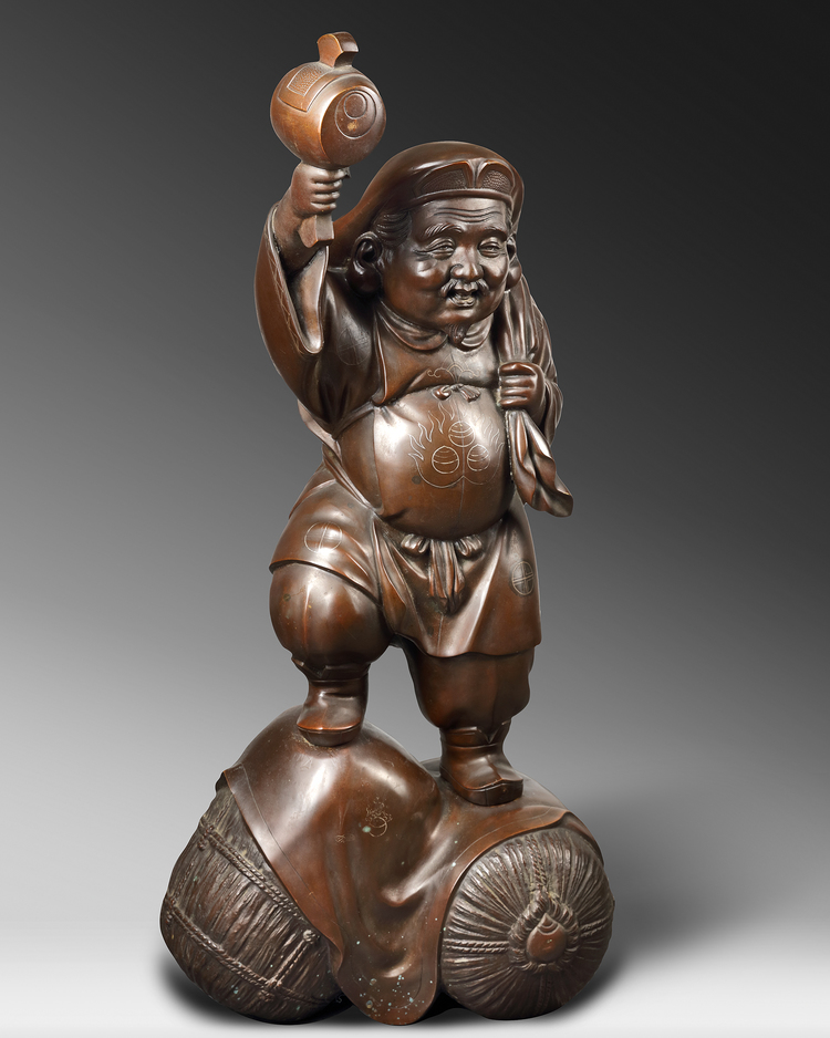 A VERY LARGE AND HEAVY JAPANESE BRONZE FIGURE OF DAIKOKU