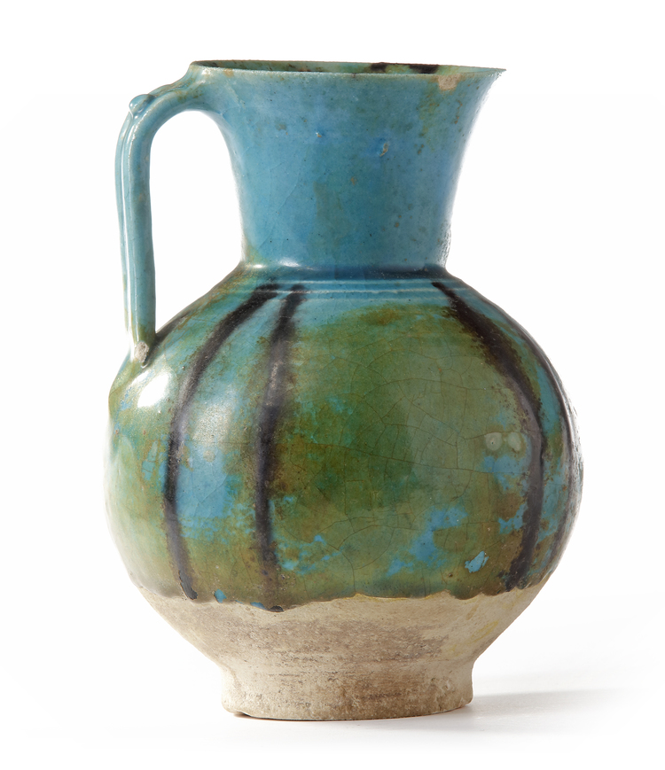 A RAQQA WARE VESSEL, SYRIA, FIRST HALF 13TH CENTURY