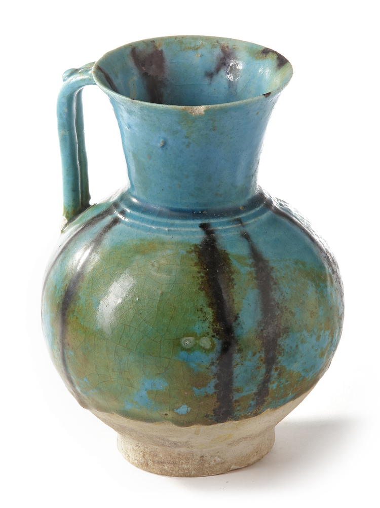 A RAQQA WARE VESSEL, SYRIA, FIRST HALF 13TH CENTURY