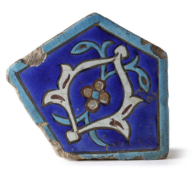 A SIX-SIDED TIMURID TILE, PERSIA, MID-15TH CENTURY
