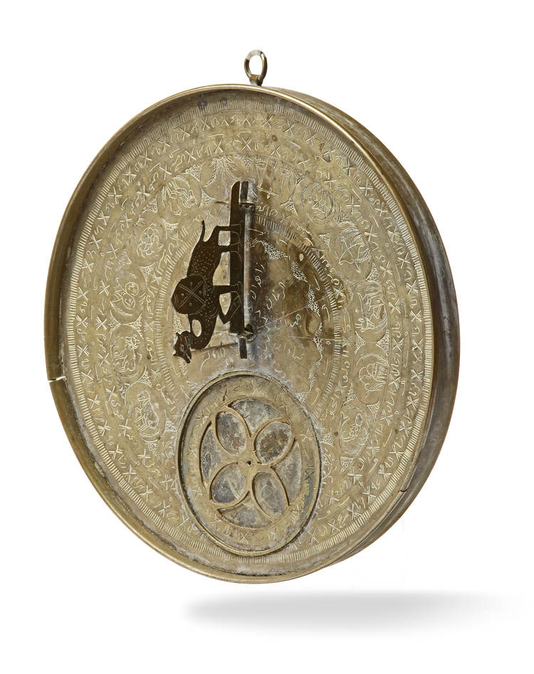 A LARGE BRASS QIBLA INDICATOR
