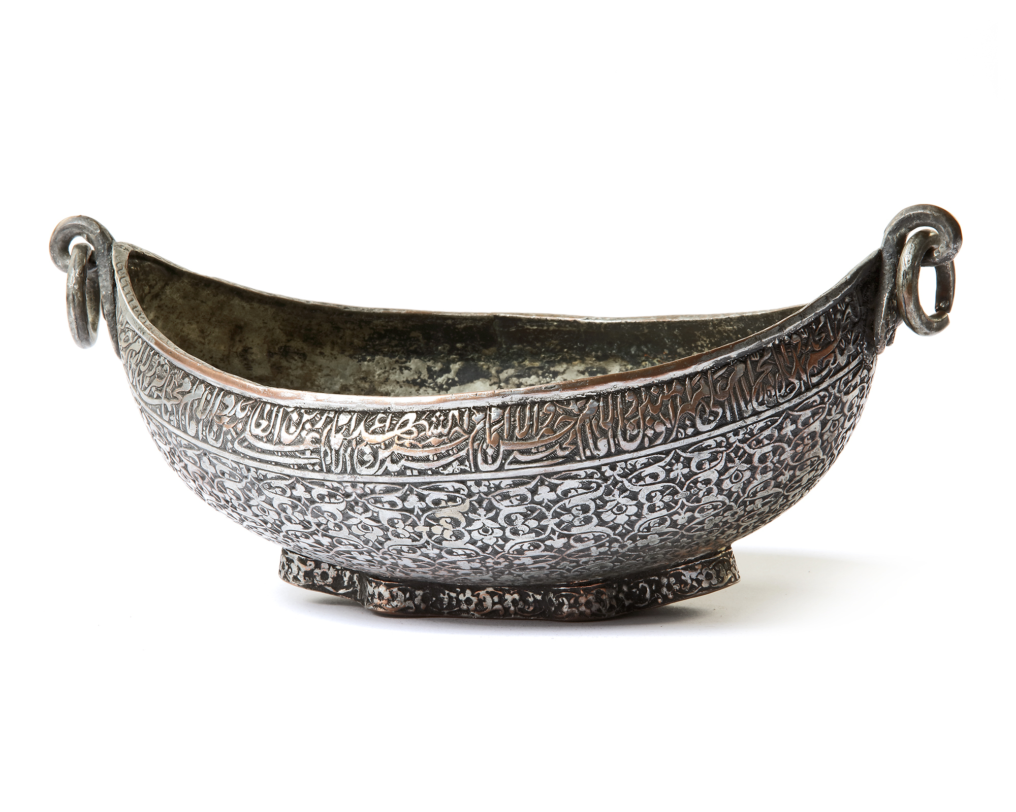 A PERSIAN TINNED-COPPER KASHKUL, 18TH CENTURY