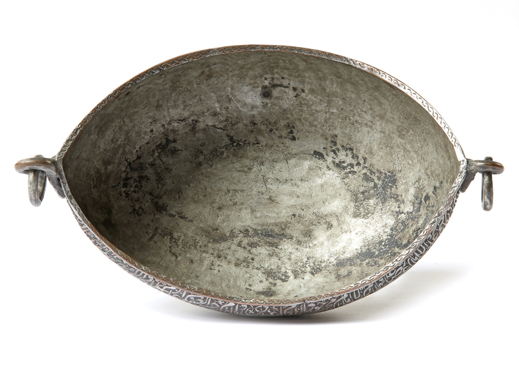 A PERSIAN TINNED-COPPER KASHKUL, 18TH CENTURY