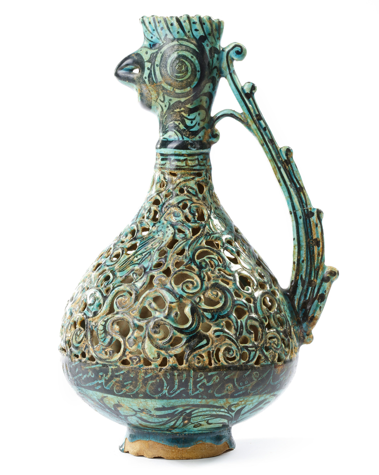 A RARE FRITWARE OPENWORK DECORATED RETICULATED EWER WITH ROOSTER HEAD ...