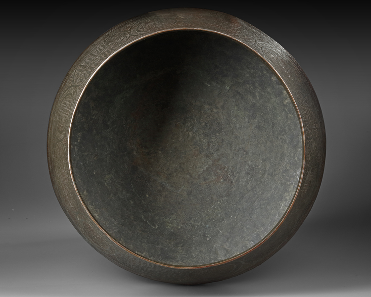 A MONUMENTAL MAMLUK TINNED COPPER BASIN , EGYPT OR SYRIA 15TH CENTURY