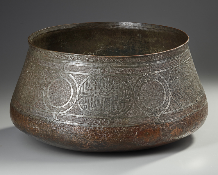 A MONUMENTAL MAMLUK TINNED COPPER BASIN , EGYPT OR SYRIA 15TH CENTURY