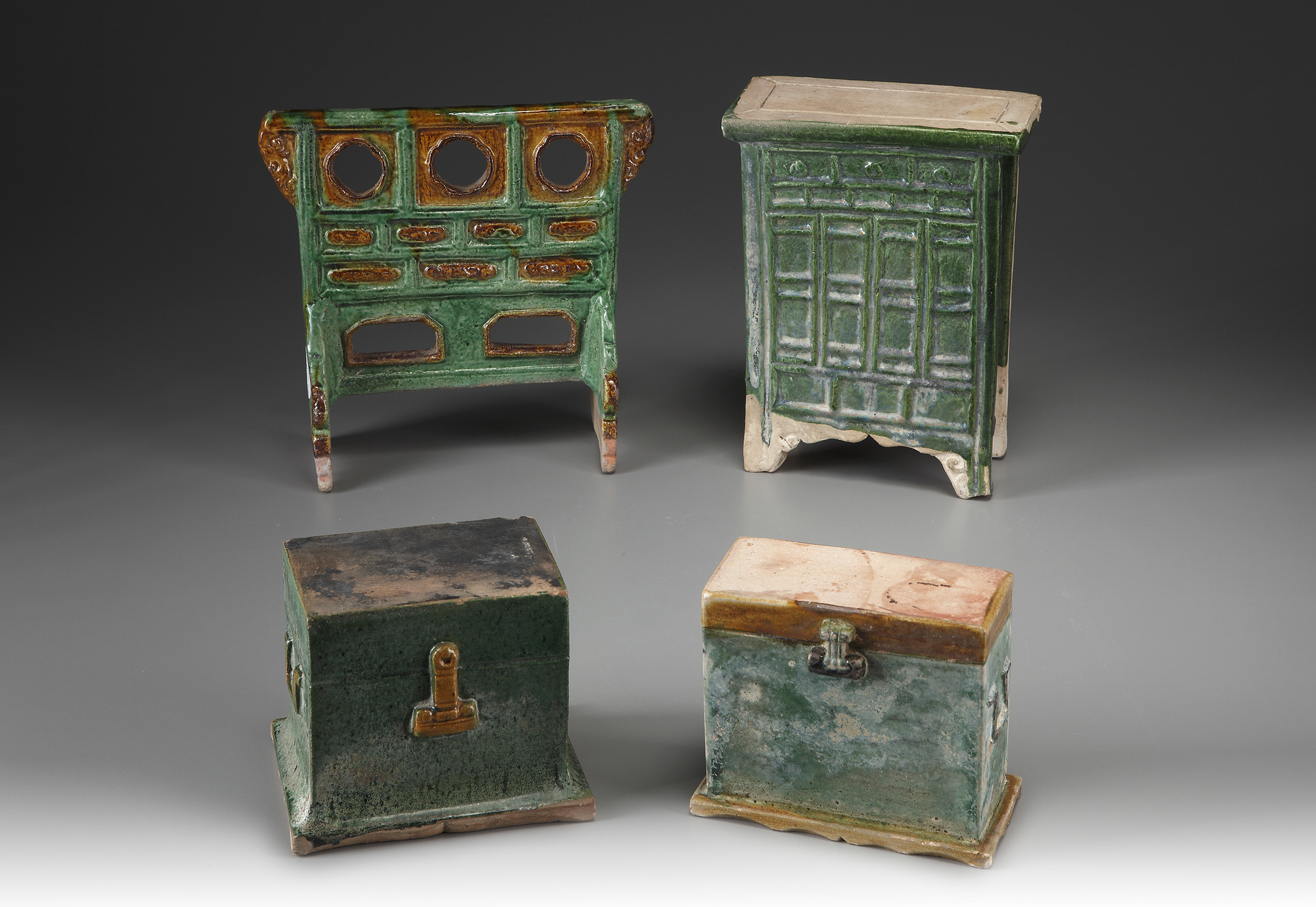 A Set Of Four Earthenware Funerary Objects