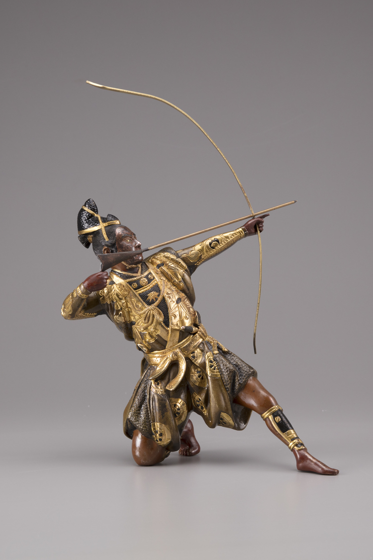 A gilt-bronze figure of a Samurai archer
