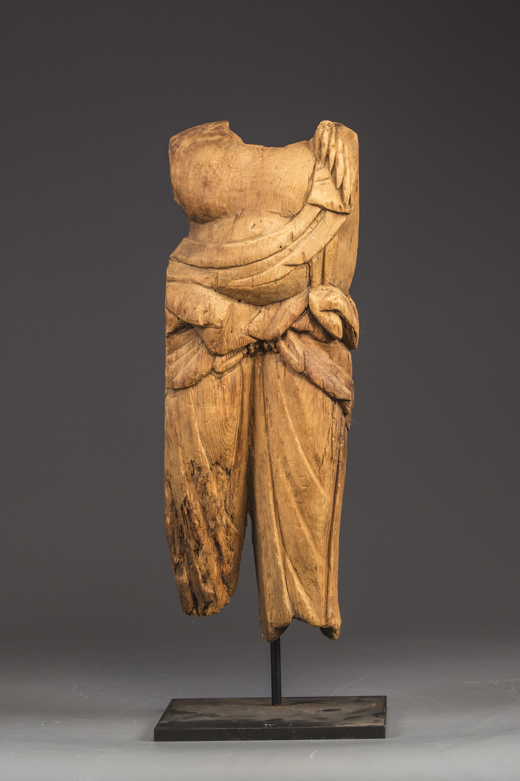 Plain wooden torso with legs from a standing Buddhist figure