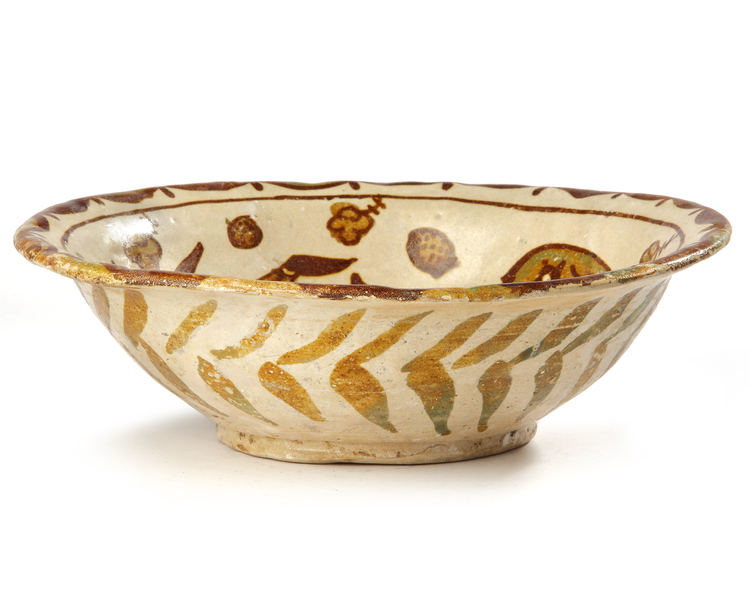 A FIGURAL ABBASID LUSTRE BOWL, MESOPOTAMIA OR CENTRAL ASIA, 9TH CENTURY