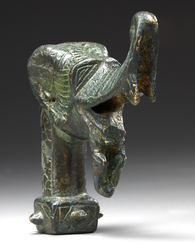 A BRONZE ELEPHANT SPOUT TERMINAL, PERSIA OR CENTRAL ASIA, 11TH-12TH CENTURY