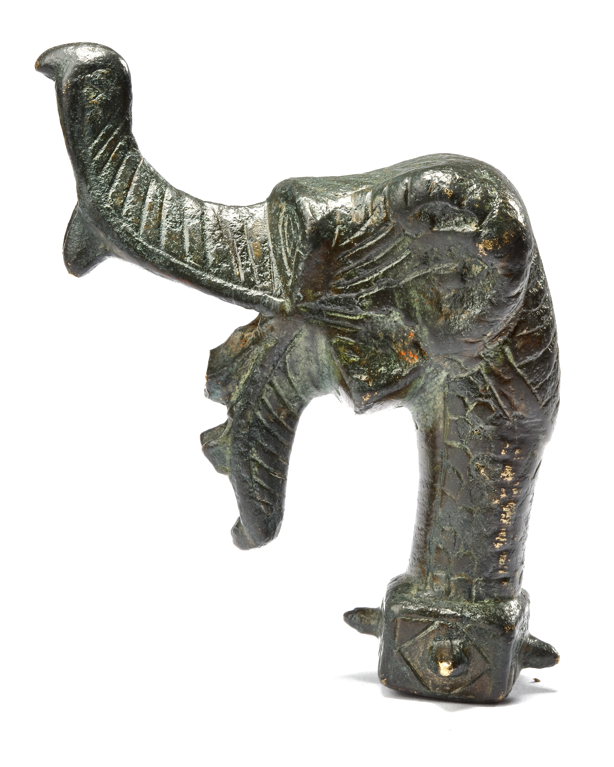 A BRONZE ELEPHANT SPOUT TERMINAL, PERSIA OR CENTRAL ASIA, 11TH-12TH CENTURY