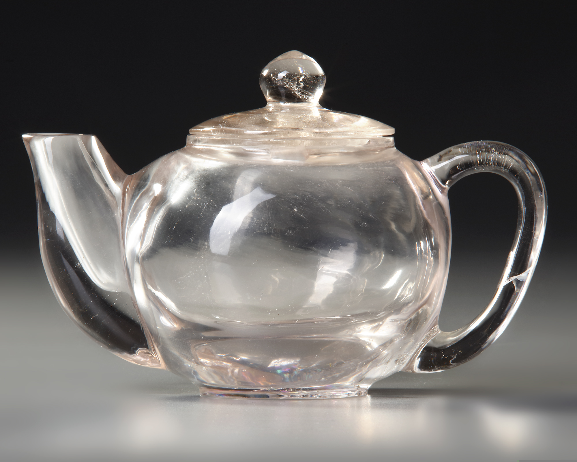 A CHINESE ROCK CRYSTAL TEAPOT AND COVER, 19TH-EARLY 20TH CENTURY