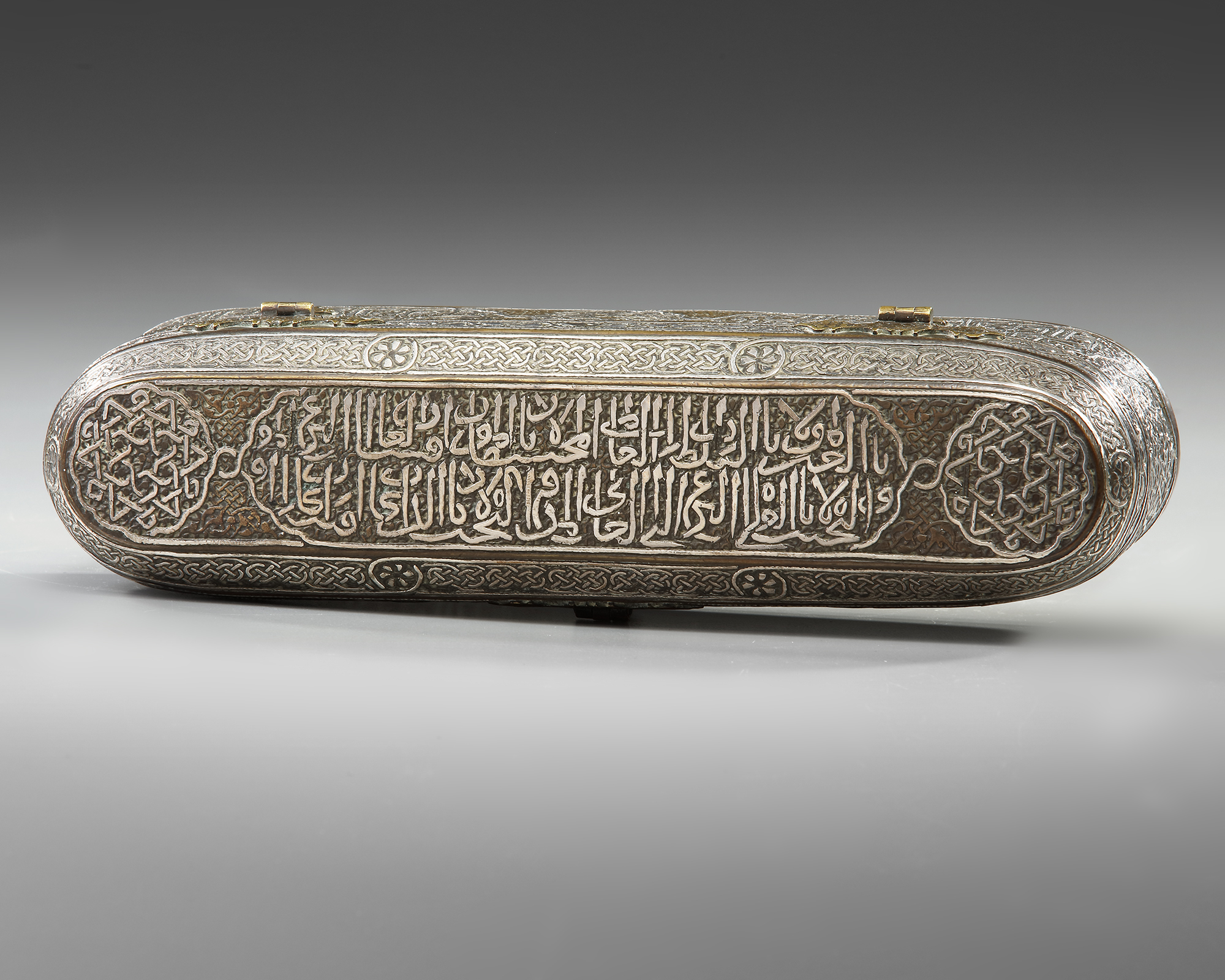 A MAMLUK STYLE SILVER INLAID PEN BOX, SYRIA OR EGYPT, 19TH-20TH CENTURY