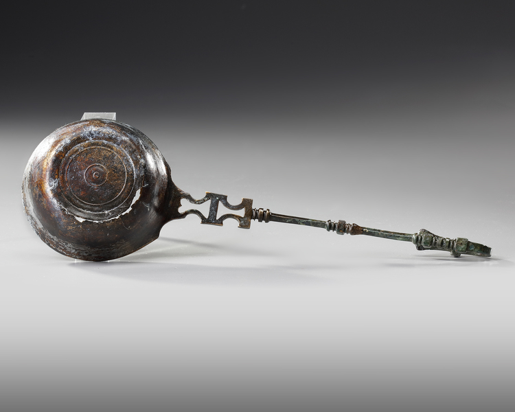 A ROMAN BRONZE LADLE, CIRCA 2ND-3RD CENTURY AD