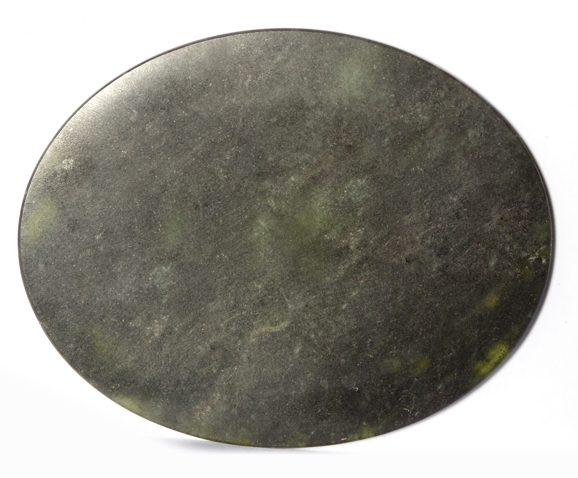 AN OVAL JADE CARVED PENDANT