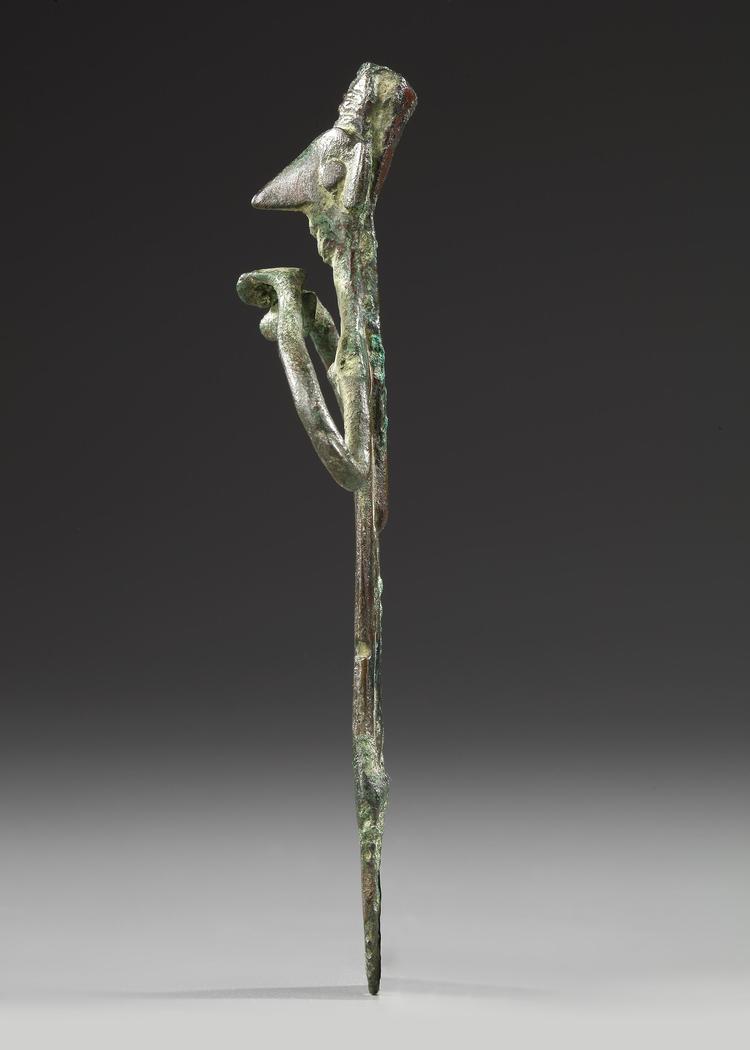 AN ELAMITE BRONZE IDOL, CIRCA 2ND MILLENNIUM B.C.