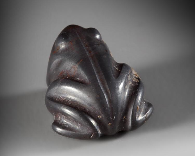 AN OLD BABYLONIAN HEMATITE FROG AMULET, CIRCA 19TH-16TH CENTURY B.C.