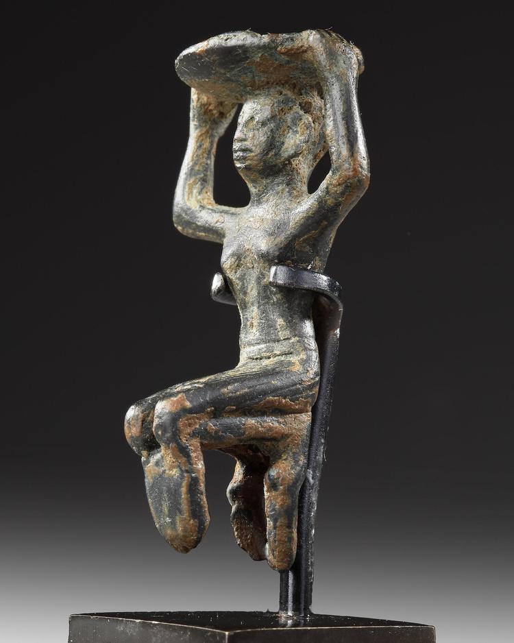 A WESTERN ASIATIC PROTO-ELAMITE STATUETTE, CIRCA 3100-2700 B.C.