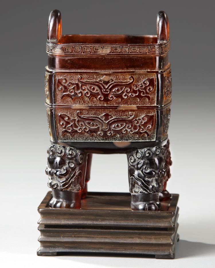 A CHINESE GLASS CENSER WITH TAOTIE DECORATION ON A STAND, QING DYNASTY ...