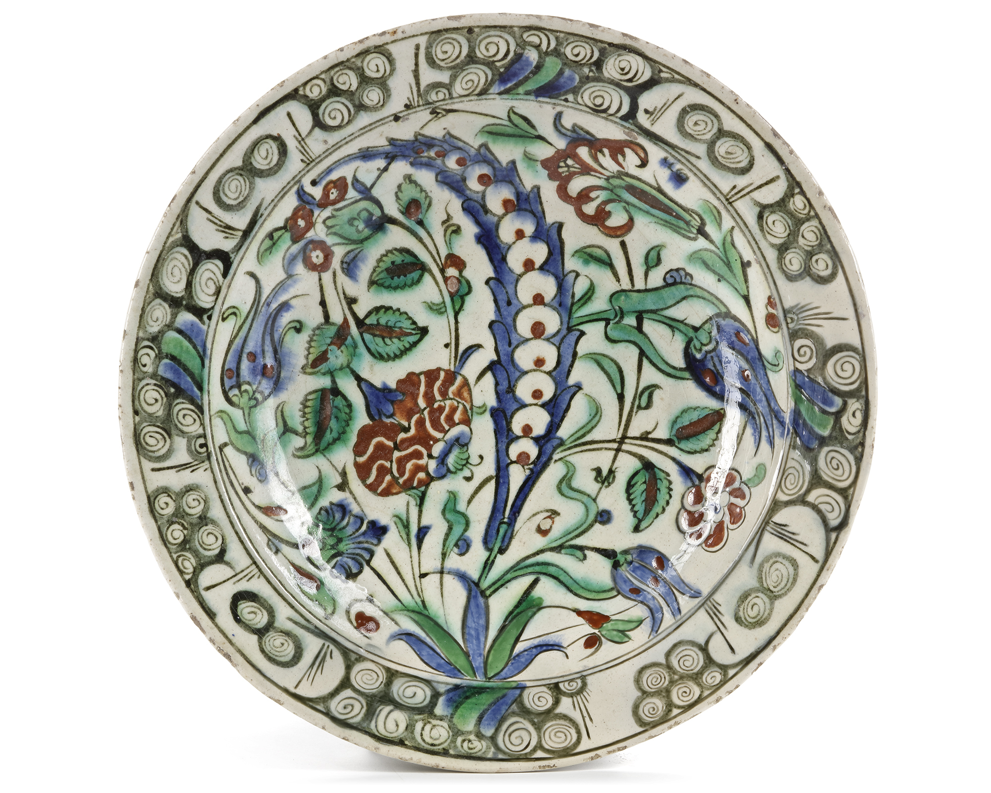 AN IZNIK POTTERY DISH WITH QUATRE FLEURS DECORATION, OTTOMAN TURKEY ...