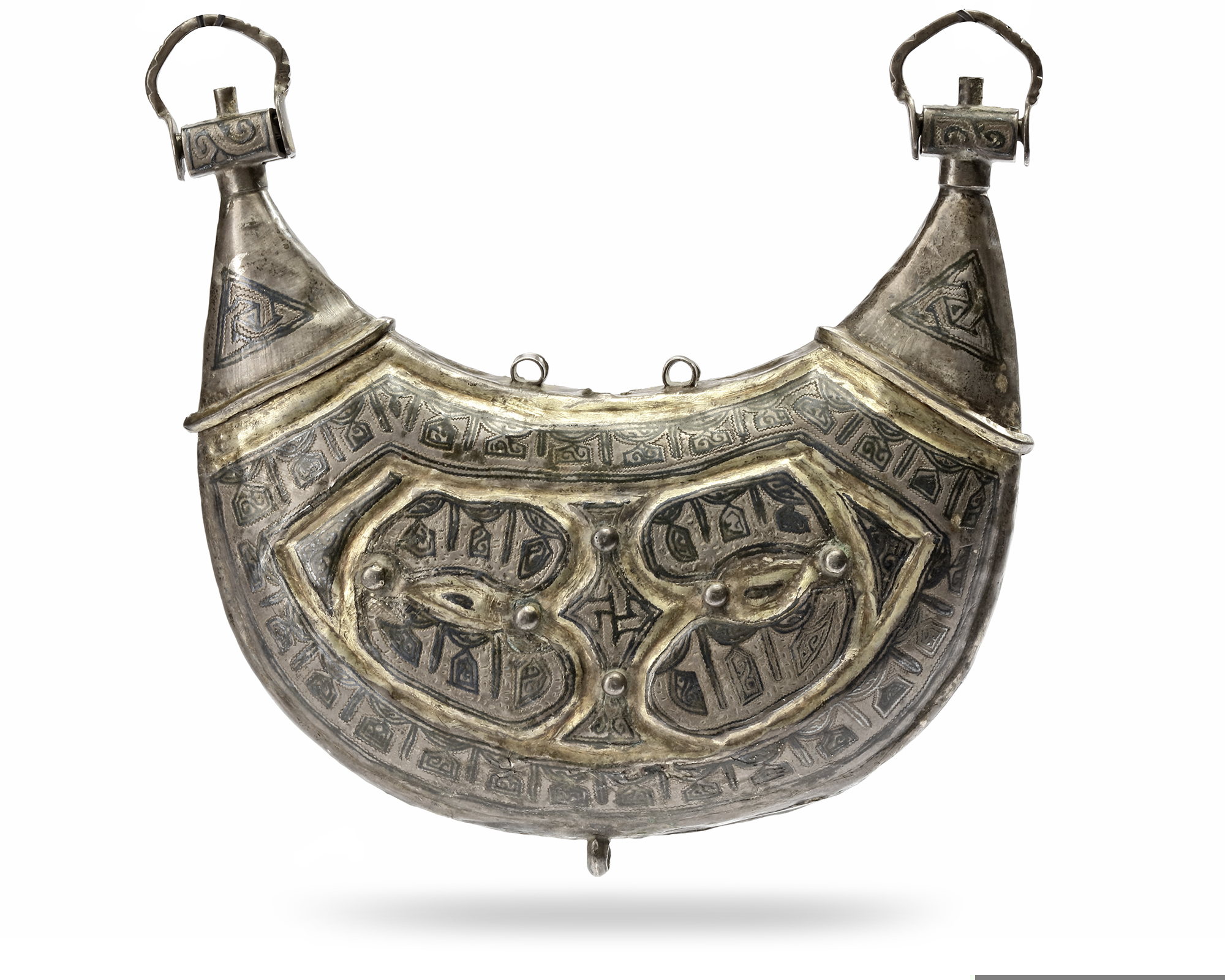 A SELJUK SILVER AND NIELLO PECTORAL AMULET CASE, PERSIA, CIRCA 12TH CENTURY