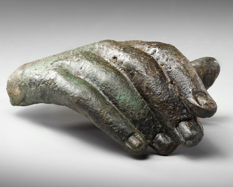A ROMAN BRONZE HAND, CIRCA 1ST-2ND CENTURY A.D.