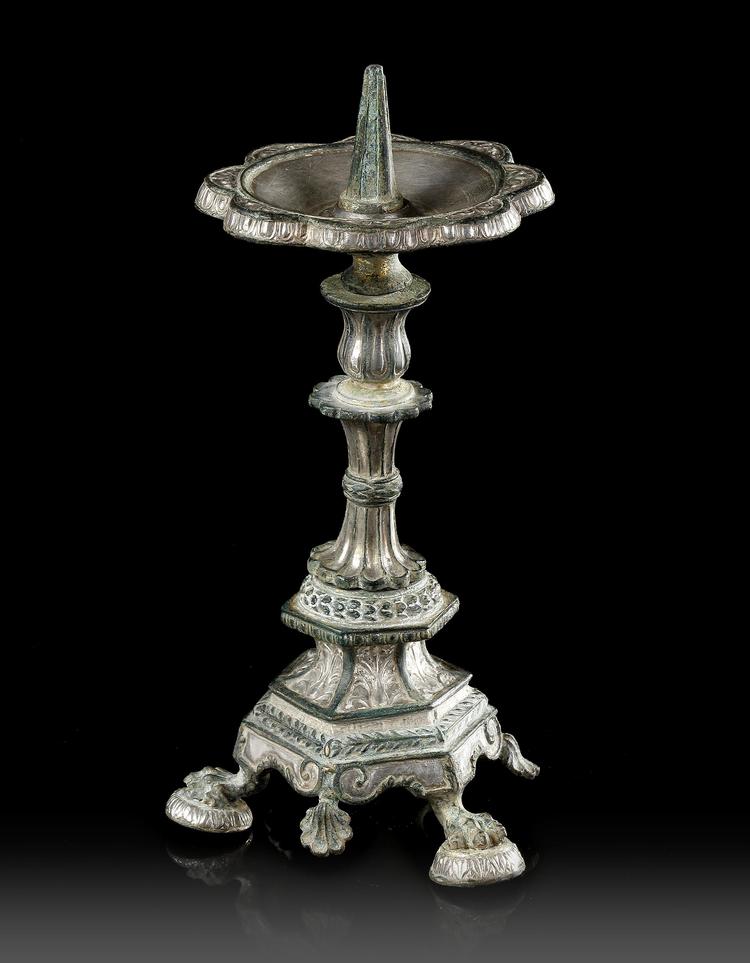 A BYZANTINE BRONZE CANDLESTICK, CIRCA 5TH-6TH CENTURY A.D.