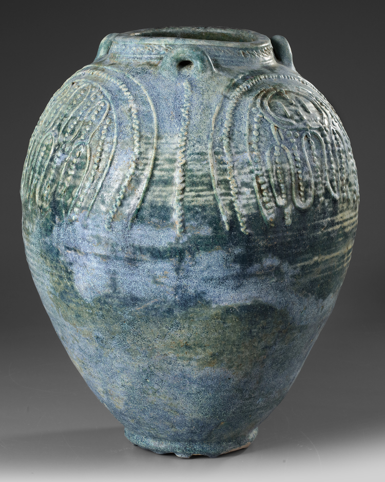 A LARGE POST SASSANIAN TURQUOISE GLAZED POTTERY STORAGE JAR, PERSIA OR ...