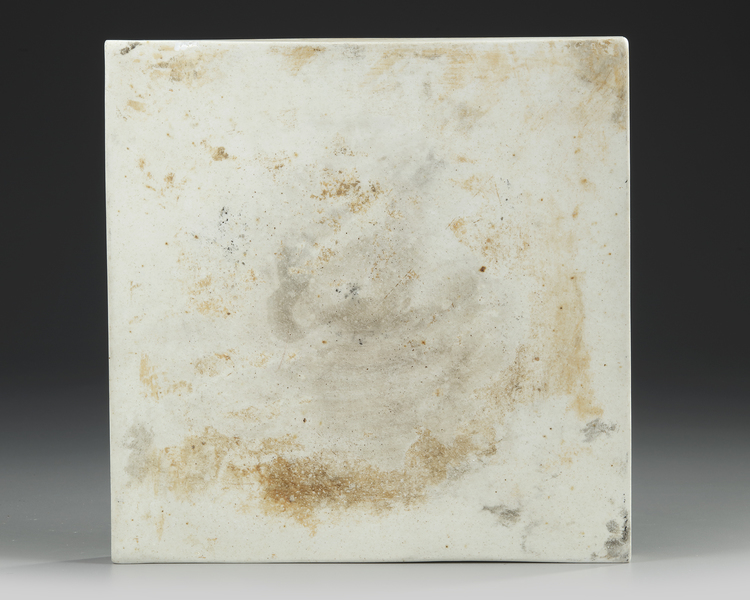 A CHINESE UNDERGLAZE COPPER RED AND BLUE TILE, QING DYNASTY (1644-1911)