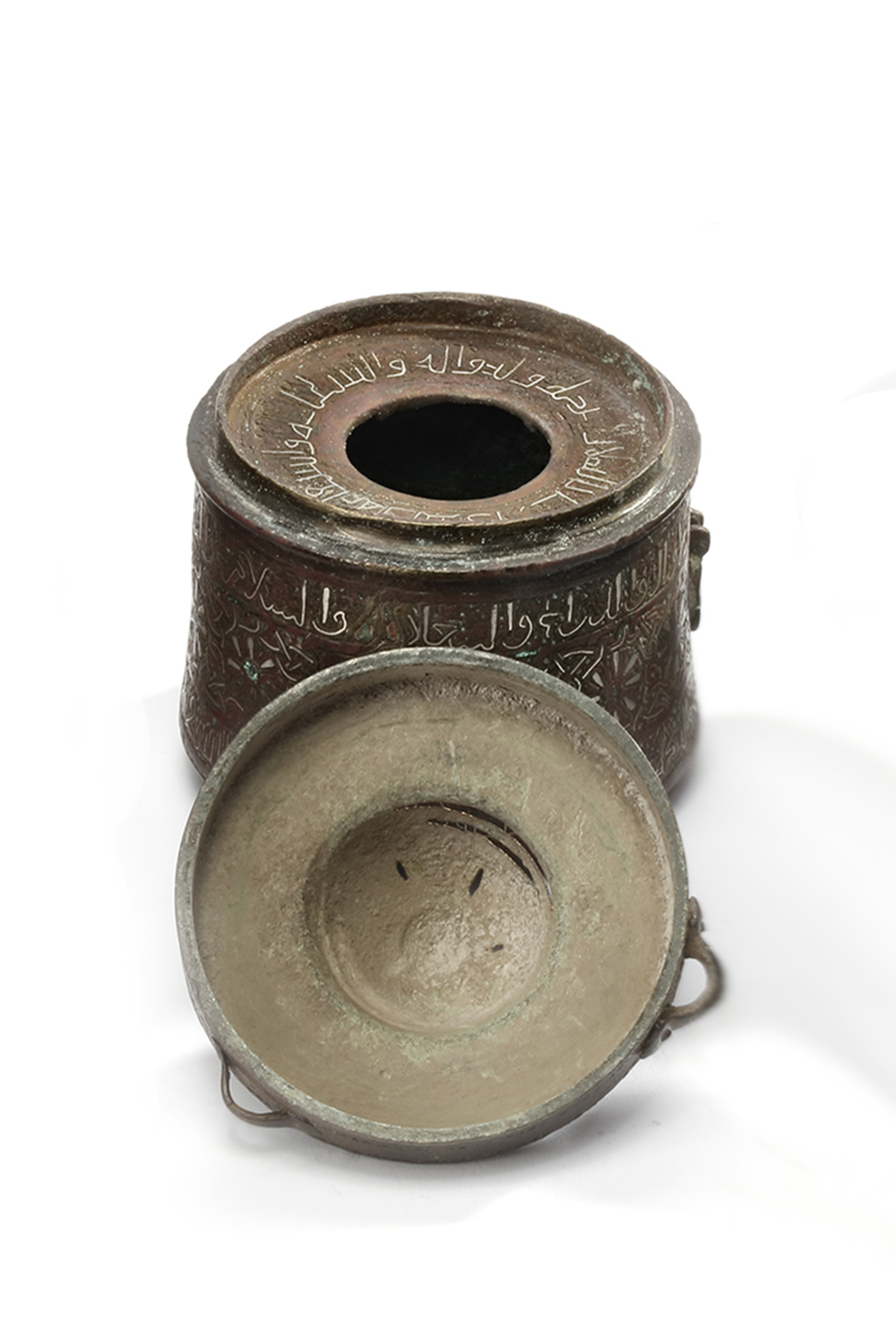 A KHURASAN SILVER- INLAID BRONZE INKWELL, 12TH-13TH CENTURY