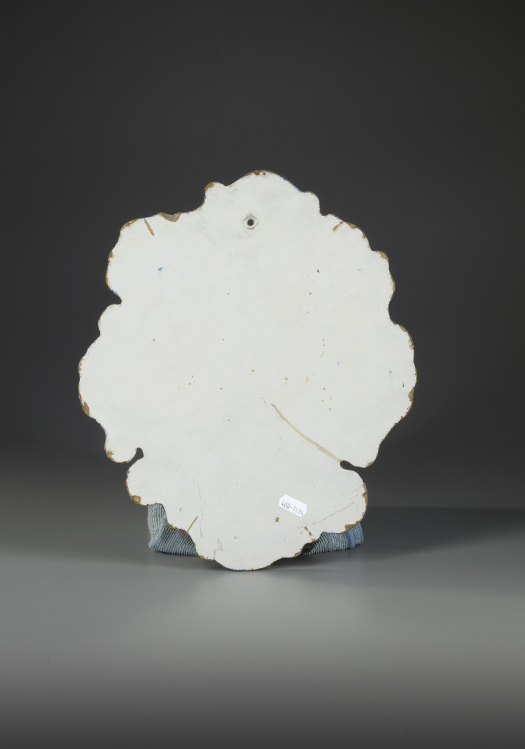 A PAIR OF MIXED TECHNIQUE POLYCHROME DELFT PLAQUES, MID 18TH CENTURY