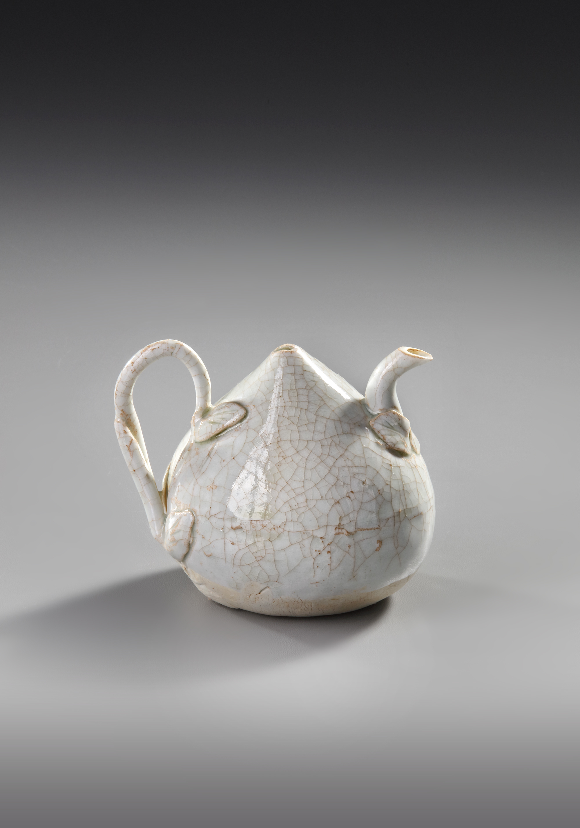 A CHINESE QINGBAI PEACH-FORM WATER DROPPER, SONG DYNASTY (960-1279)